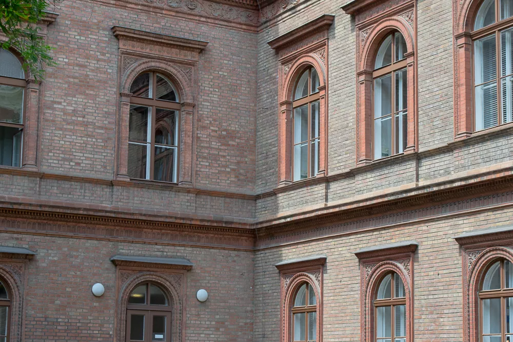Sixteen warm photographs of Vienna's rare red brick buildings